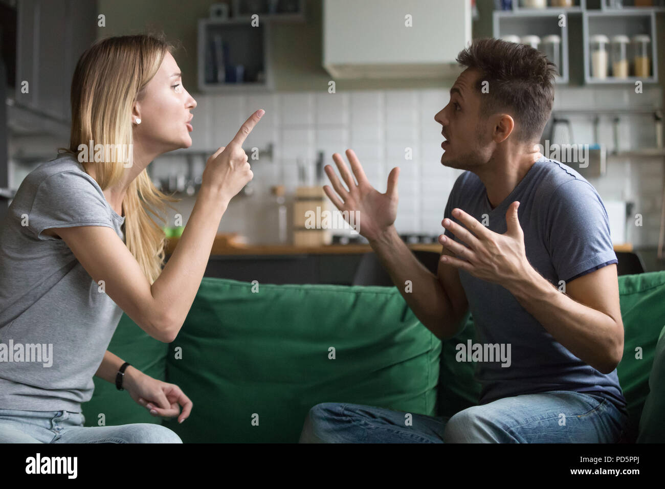 Angry Millennial Couple Arguing Shouting Blaming Each Other Of P Stock