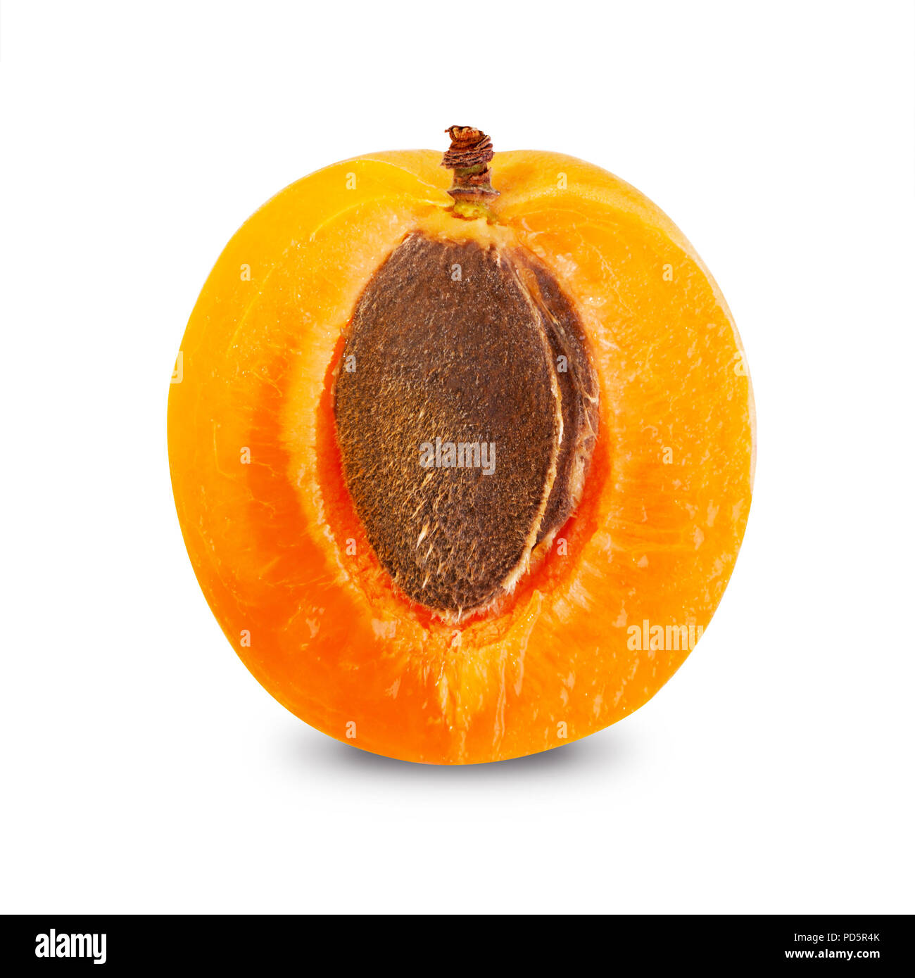 Half apricot with bone isolated on white background Stock Photo - Alamy