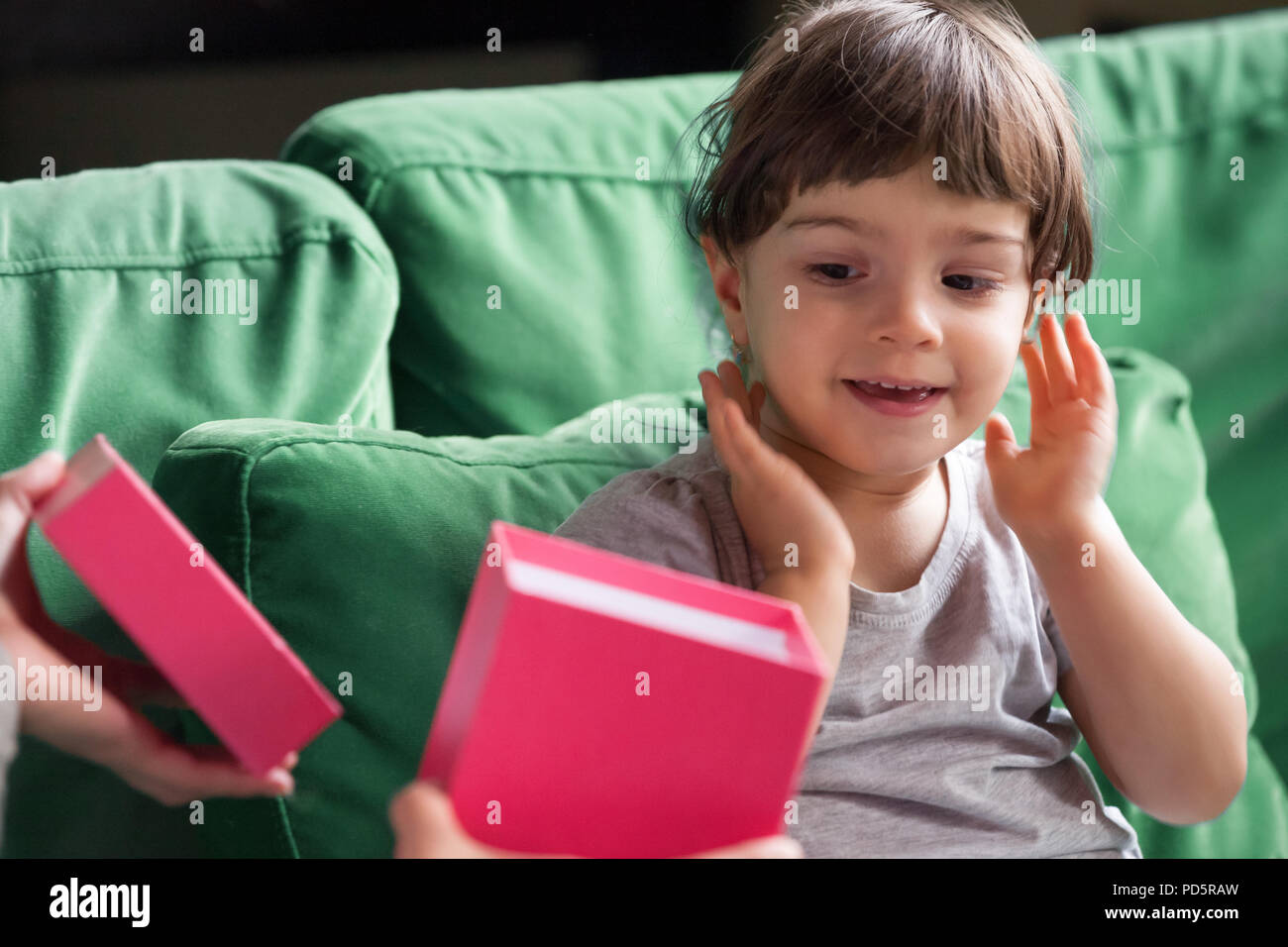 Curious shy hi-res stock photography and images - Alamy