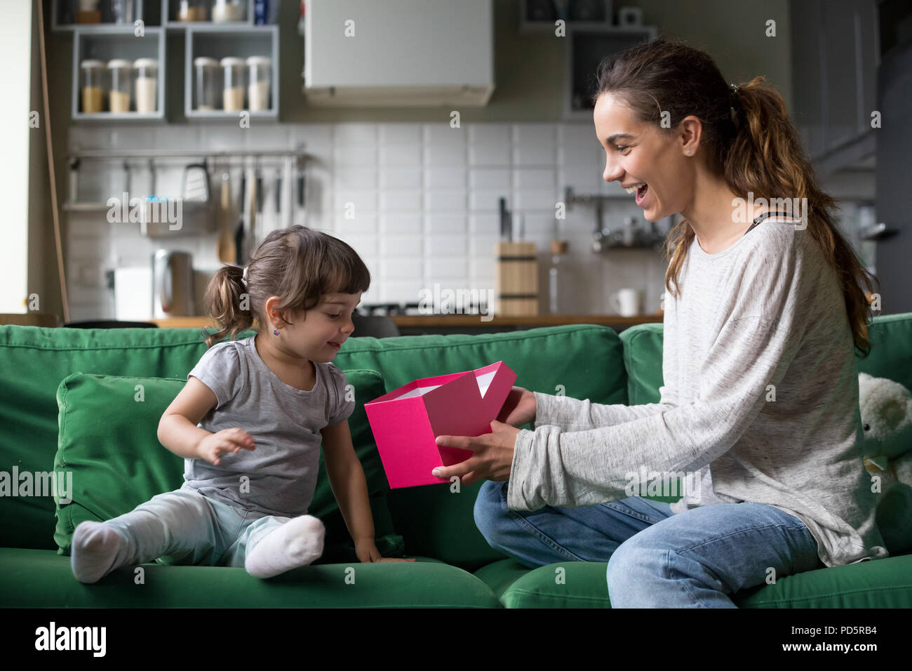 Excited kid open present hi-res stock photography and images - Alamy