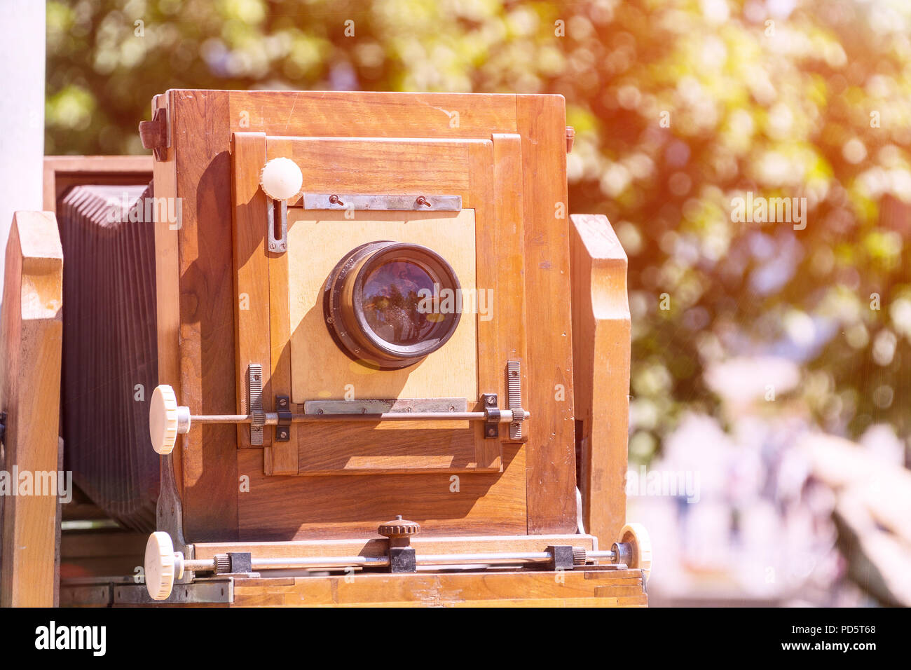 Antique old vintage camera on natural background Stock Photo - Alamy