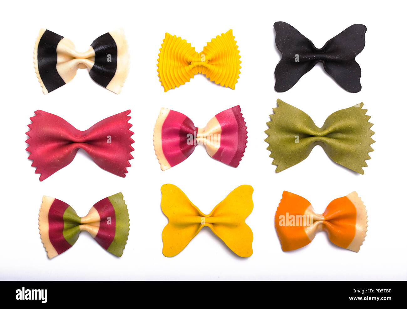 Handmade multi-colored paste in the shape of a bow on a white ...