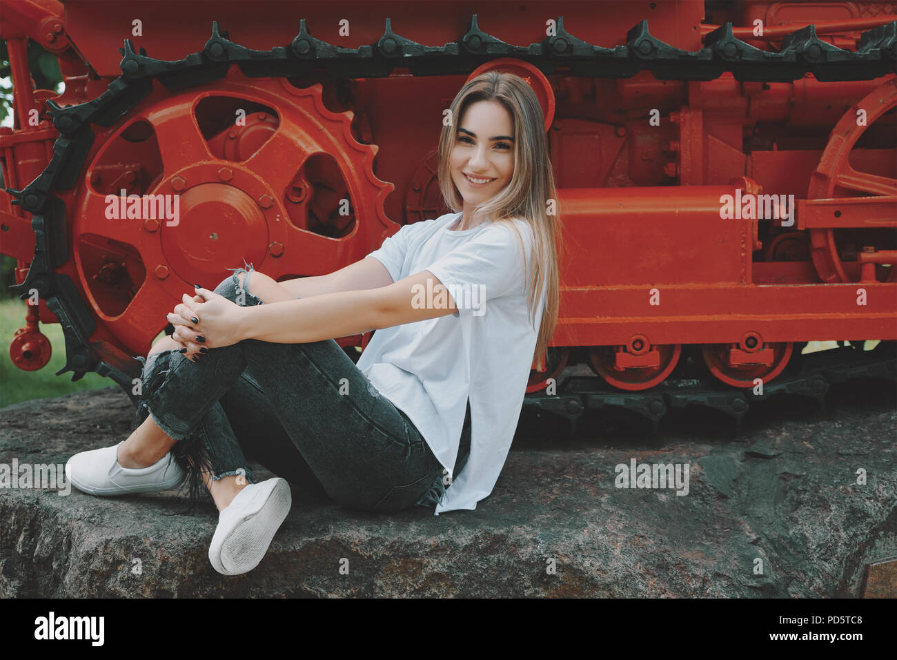 Woman and heavy metal machine Stock Photo - Alamy