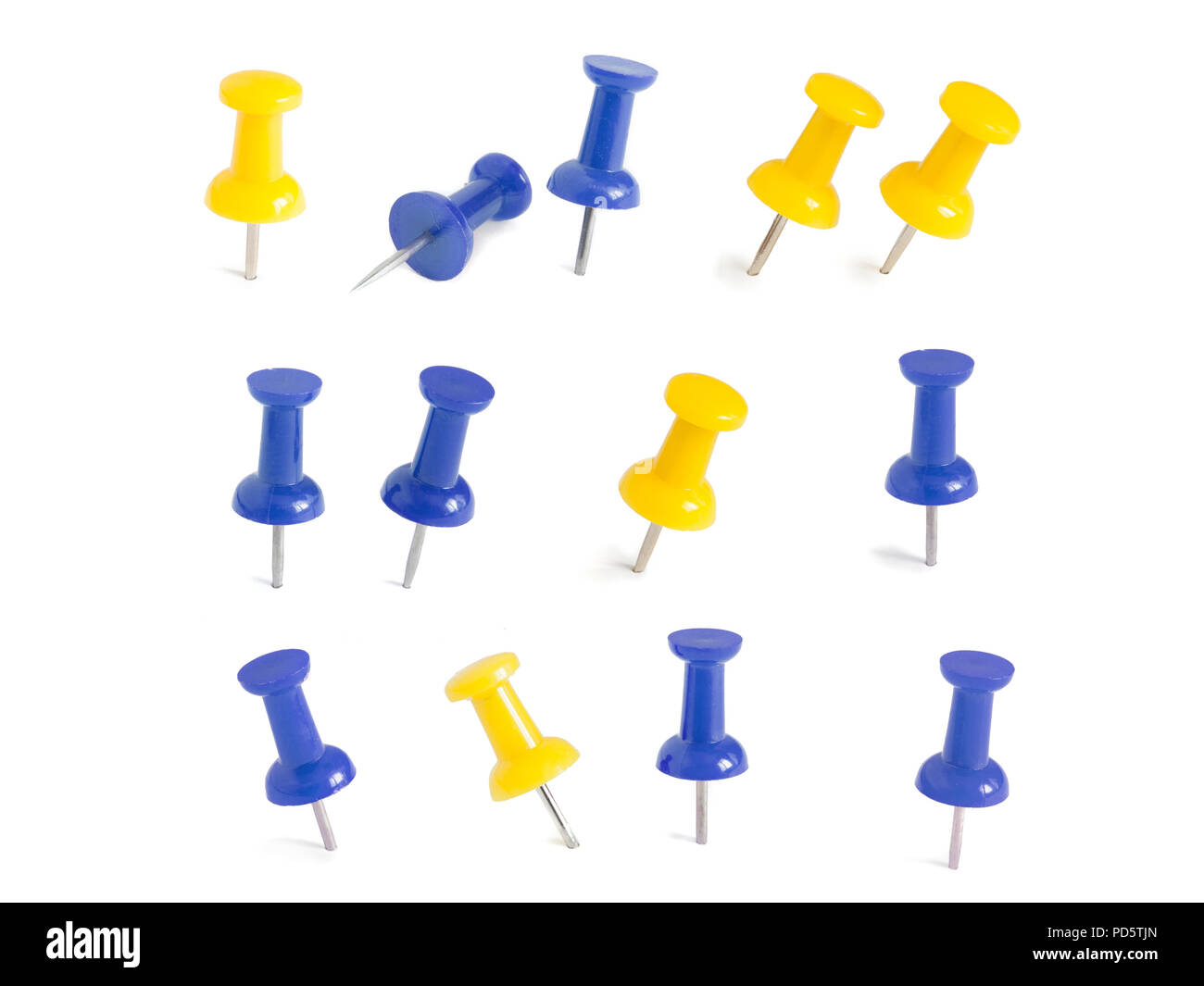 isolated blue and yellow push pins in white background Stock Photo - Alamy