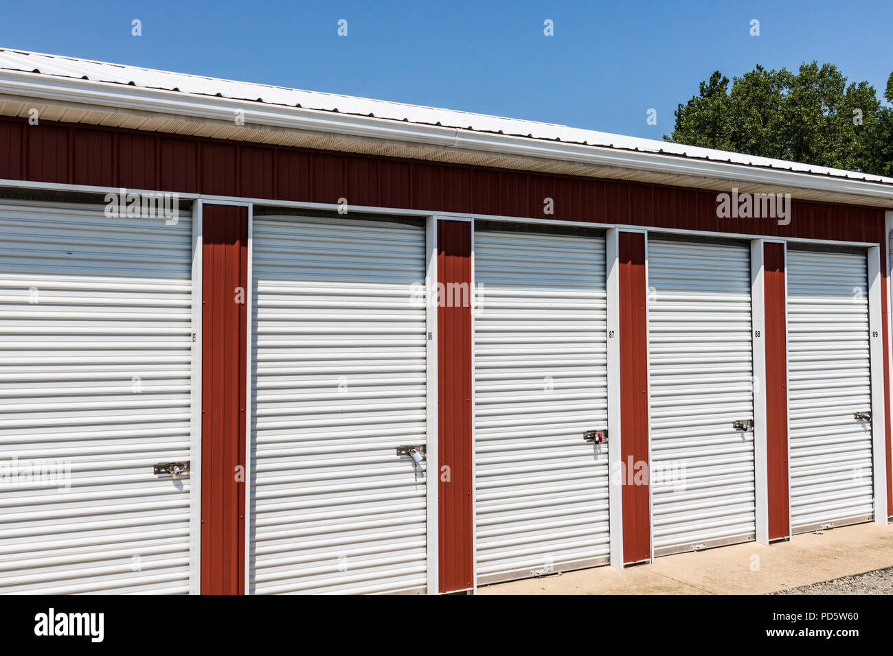 Numbered self storage and mini storage garage units Stock Photo - Alamy