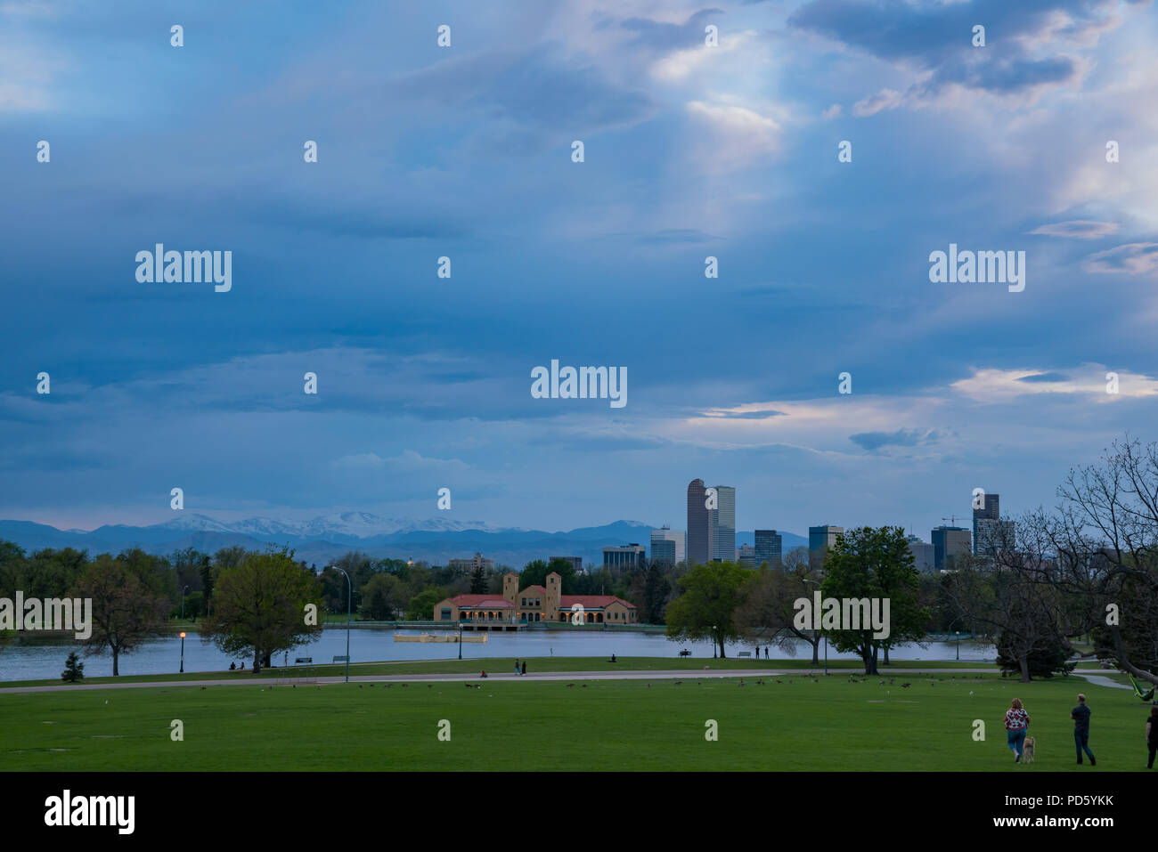 Afternoon cloudy view of the downtown skyline from city park at Denver ...