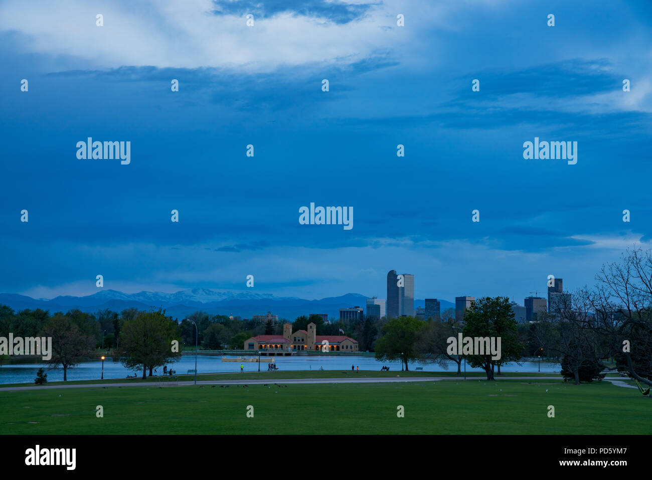 Afternoon cloudy view of the downtown skyline from city park at Denver ...