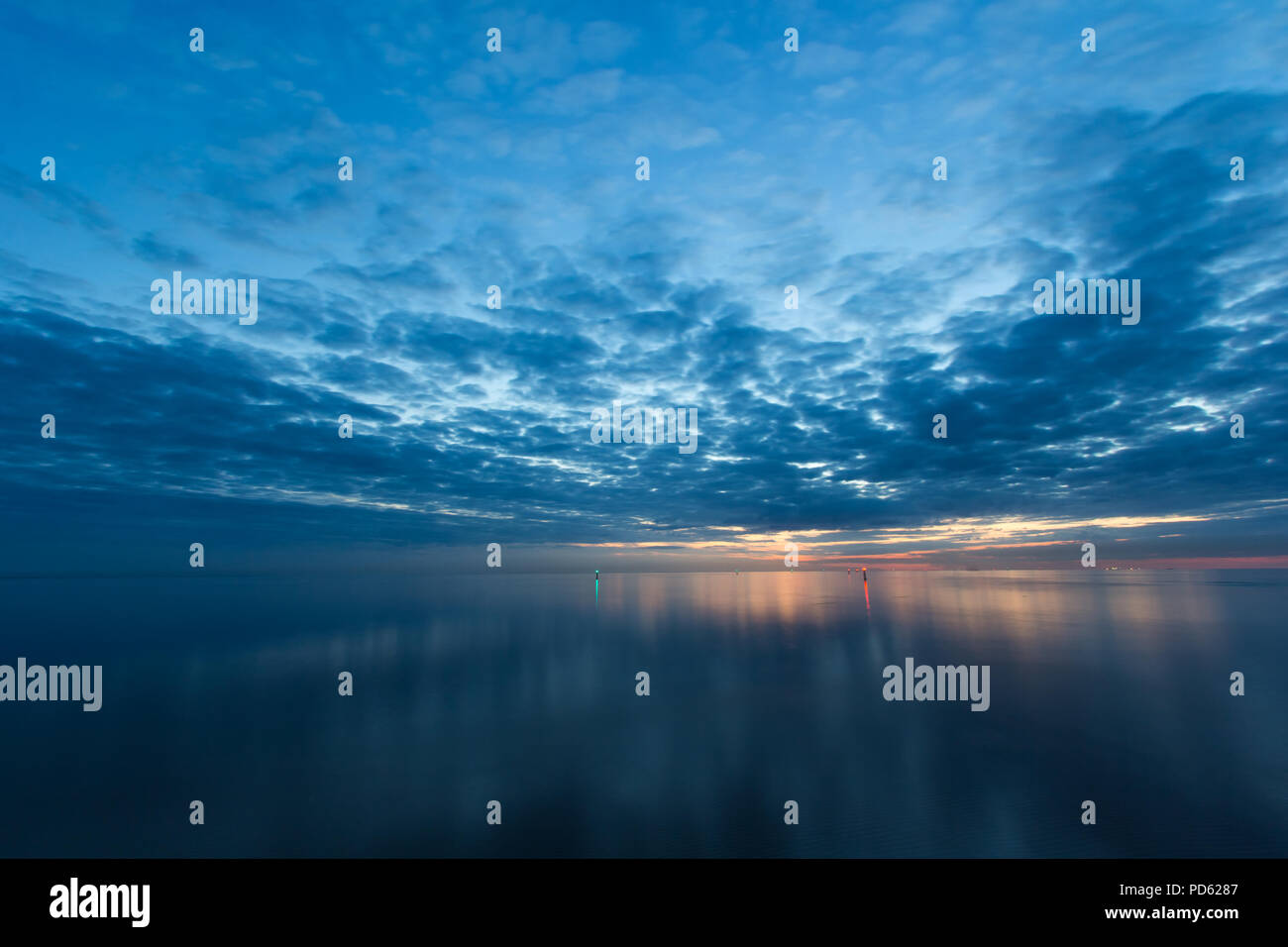 Sea dramatic sky sunset back lit hi-res stock photography and images ...