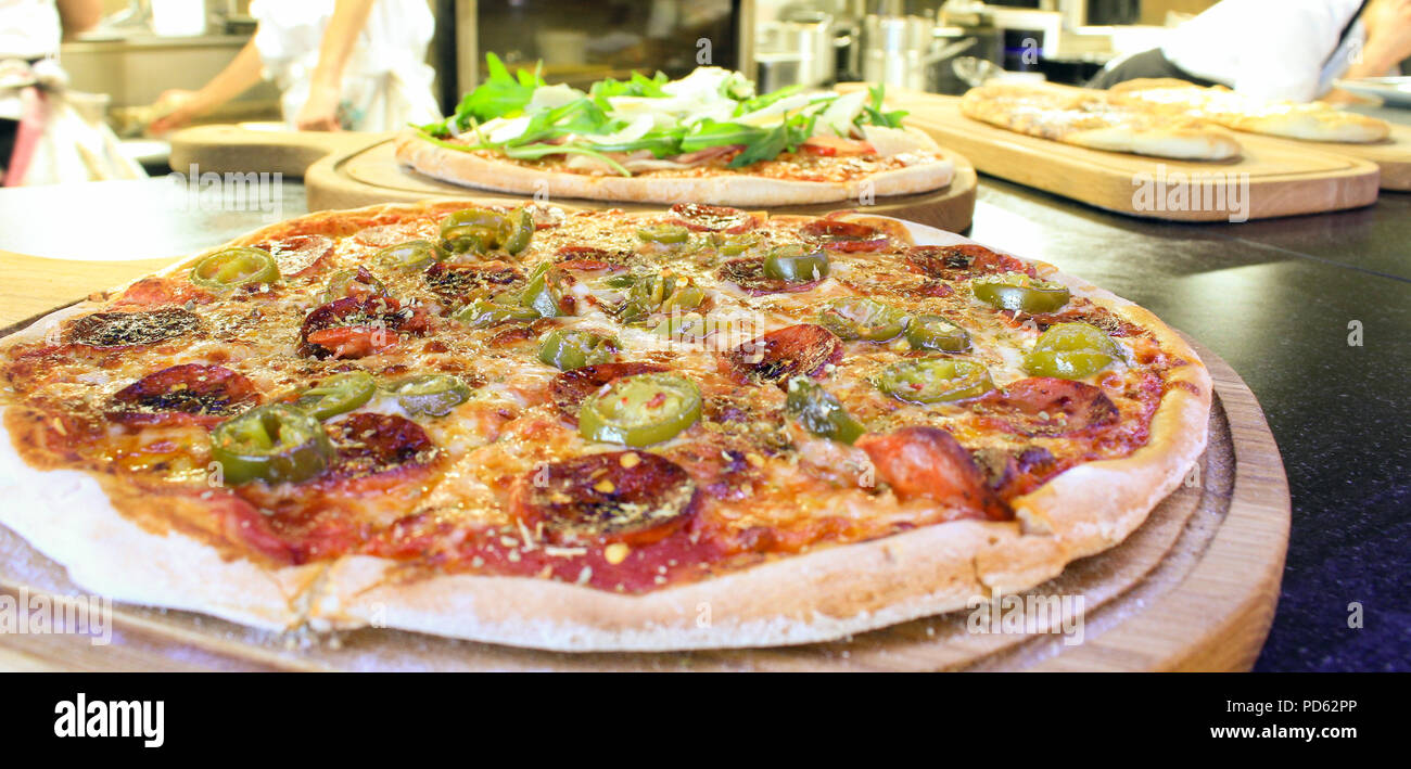 fresh cooked pizza Stock Photo - Alamy