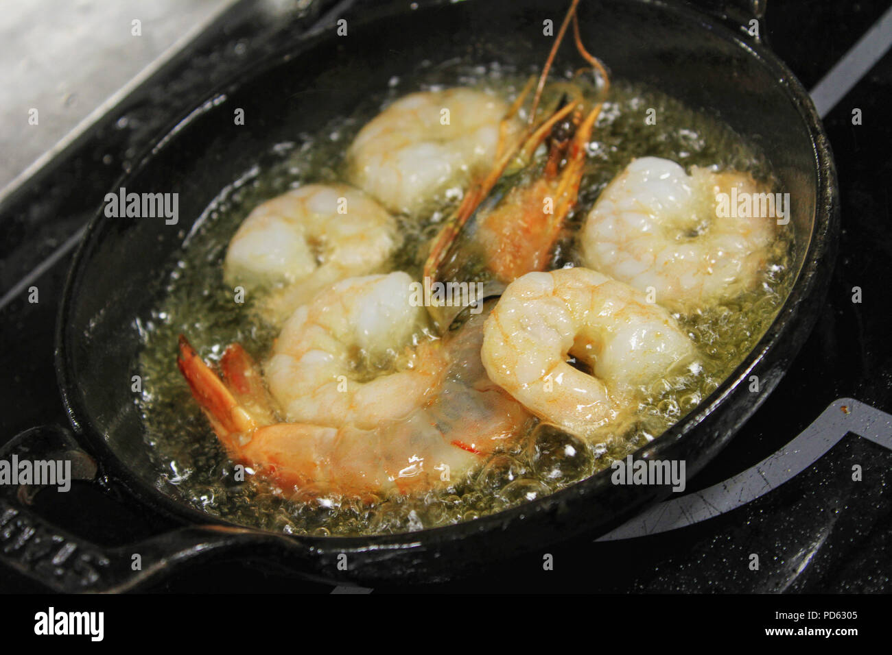 baked shellfish in sweet chili sauce Stock Photo - Alamy
