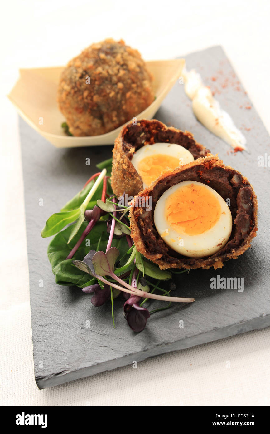 traditional scotch egg appetizer Stock Photo - Alamy