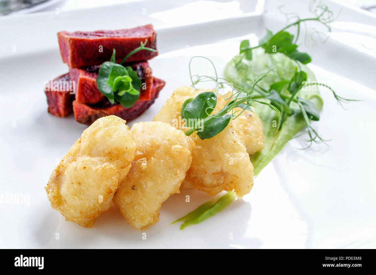battered scallop appetizer Stock Photo - Alamy