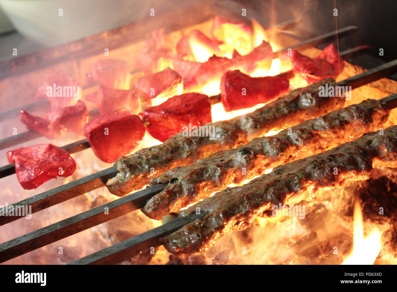 Indian cooking flame grilled hi-res stock photography and images - Alamy