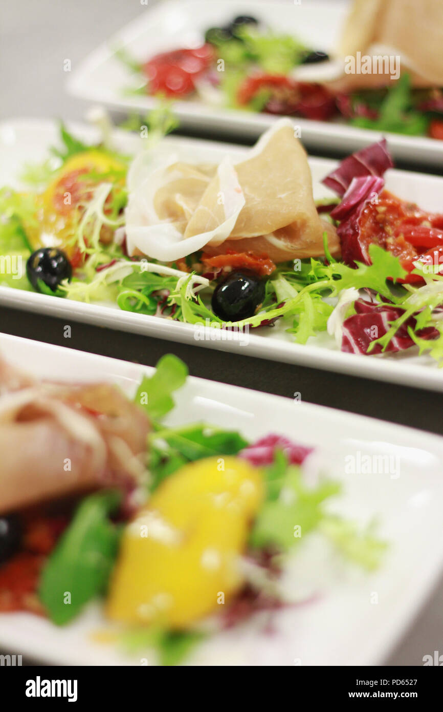 preparing salads in kitchen Stock Photo - Alamy