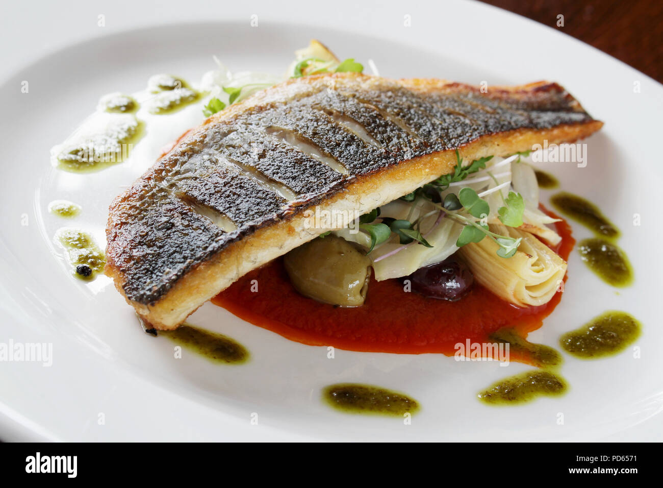 Plated fish hi-res stock photography and images - Alamy