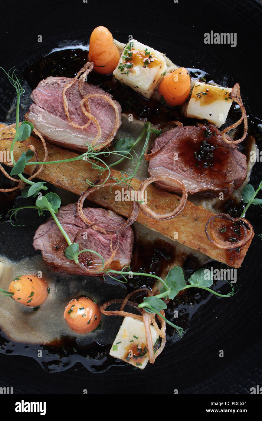plated lamb main Stock Photo - Alamy