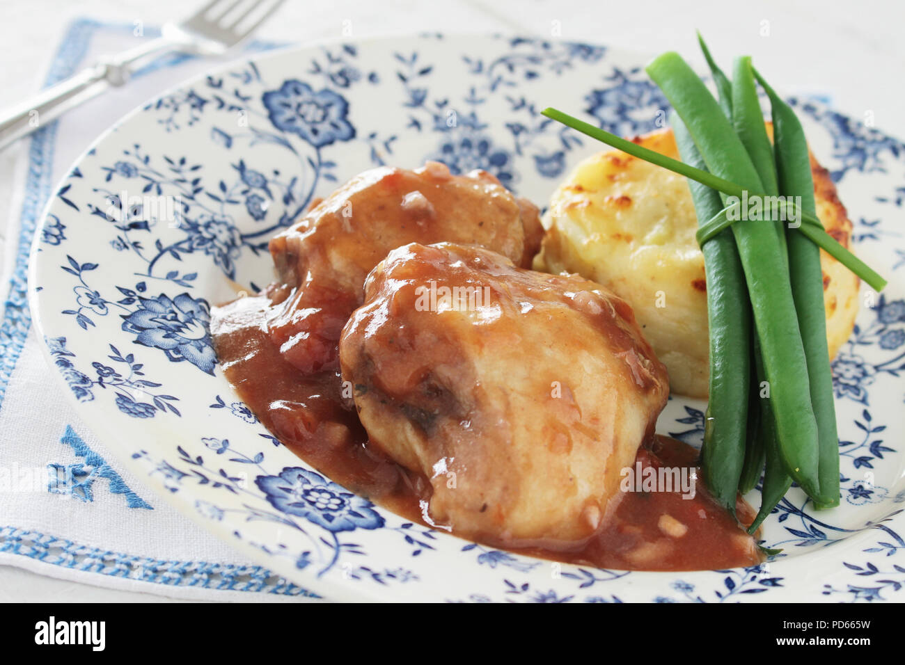 plated chicken main meal Stock Photo - Alamy
