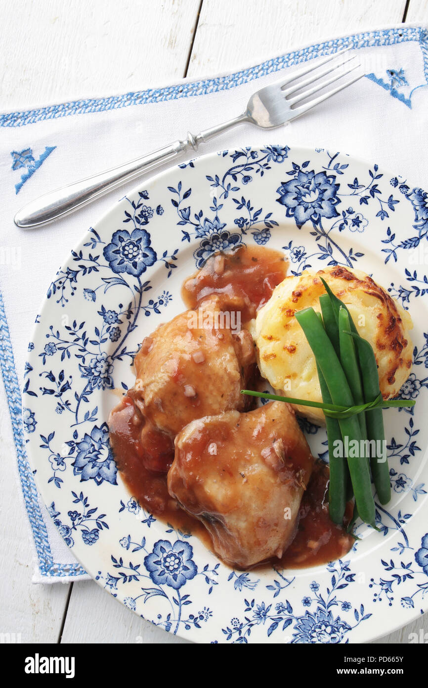plated chicken main meal Stock Photo - Alamy