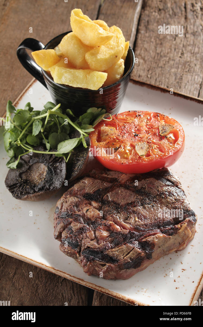 Rib eye rib eye beef steak grilled plated food hi-res stock photography ...