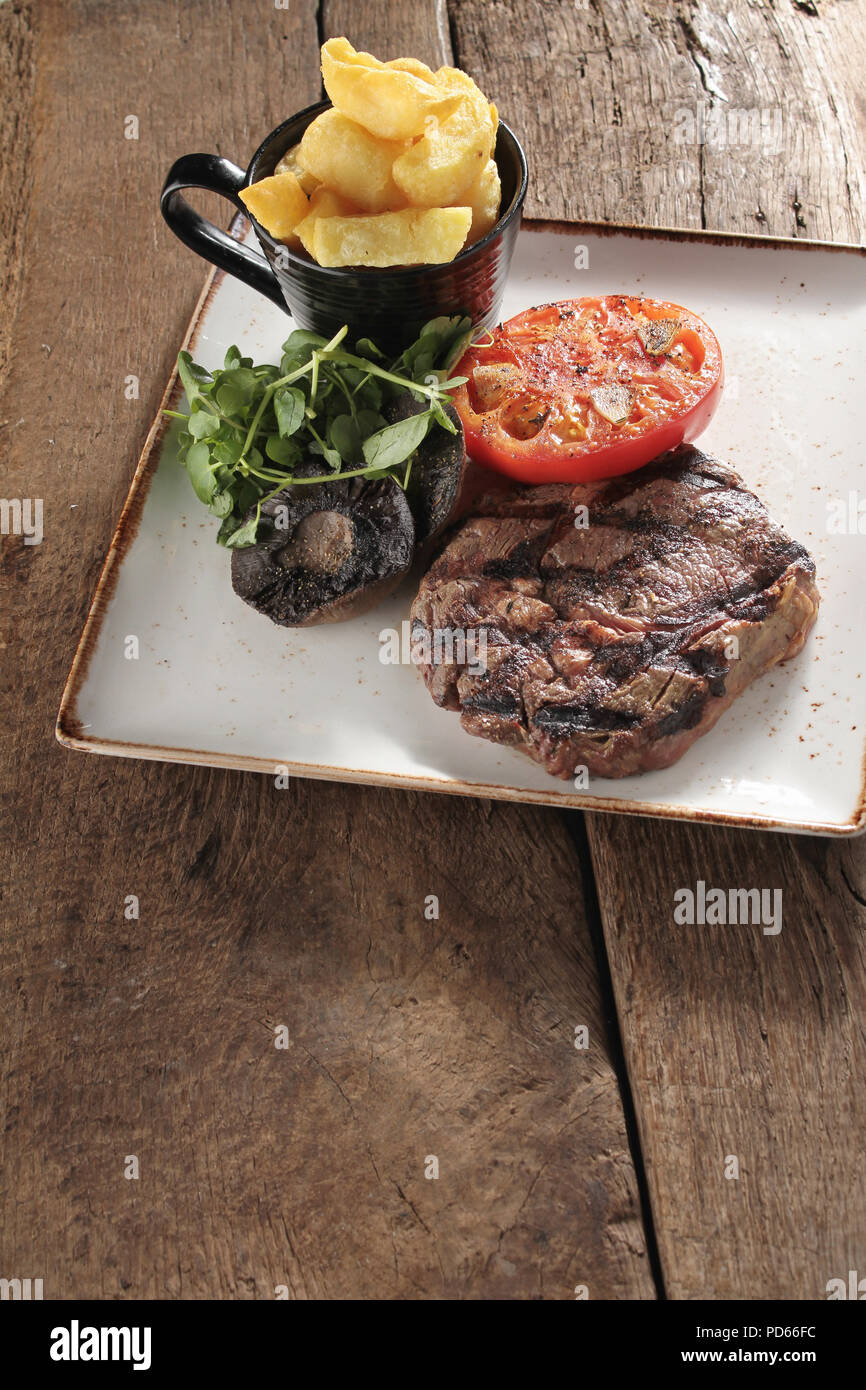 Rib eye rib eye beef steak grilled plated food hi-res stock photography ...