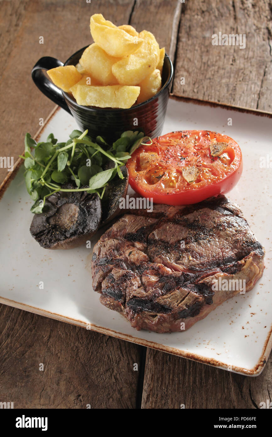 Rib eye rib eye beef steak grilled plated food hi-res stock photography ...