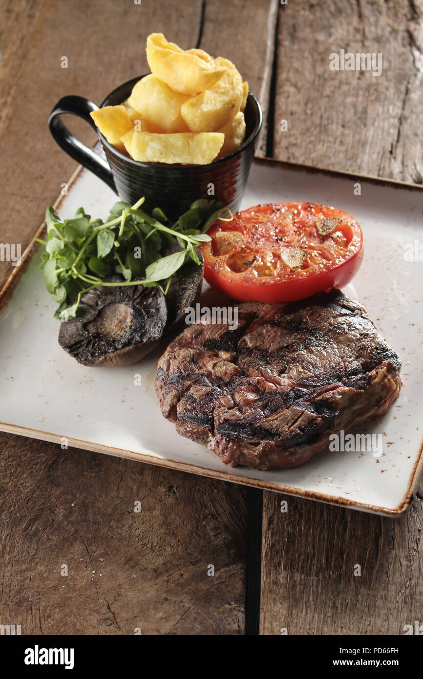 Rib eye rib eye beef steak grilled plated food hi-res stock photography ...