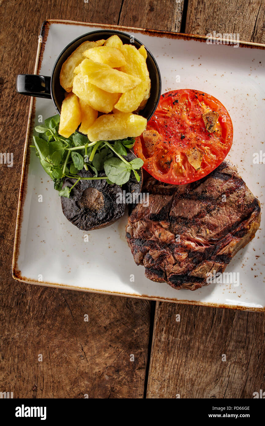 Rib eye rib eye beef steak grilled plated food hi-res stock photography ...