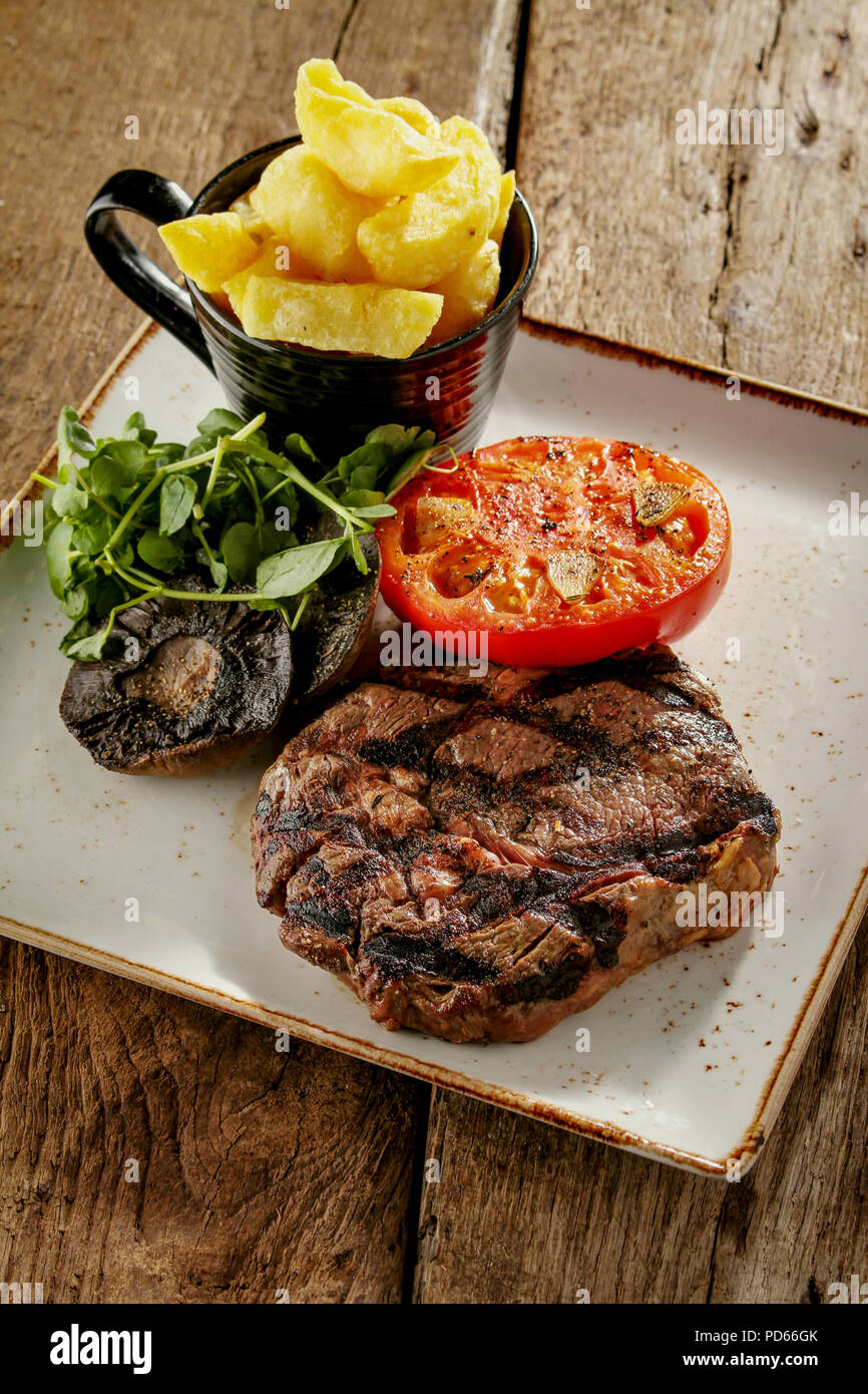 plated ribeye steak dinner Stock Photo - Alamy