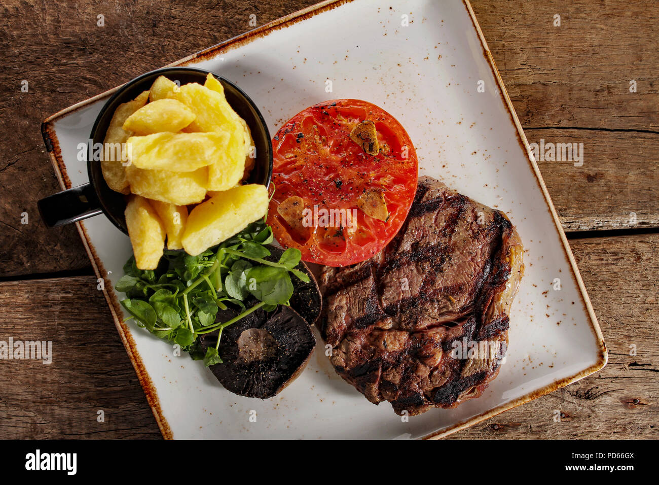 plated ribeye steak dinner Stock Photo - Alamy