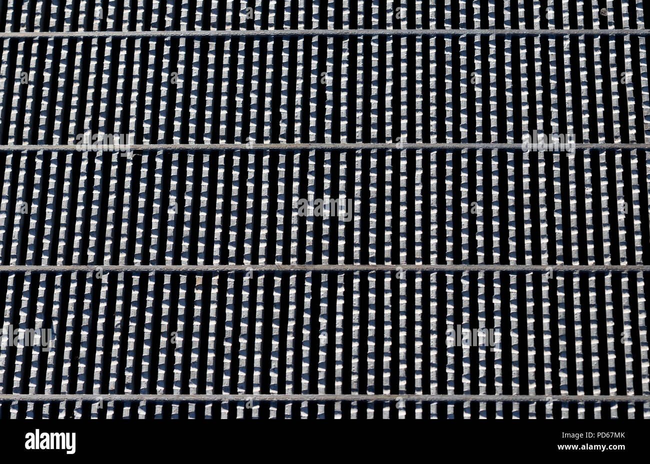 Street grate storm drain close up wallpaper background abstract Stock ...