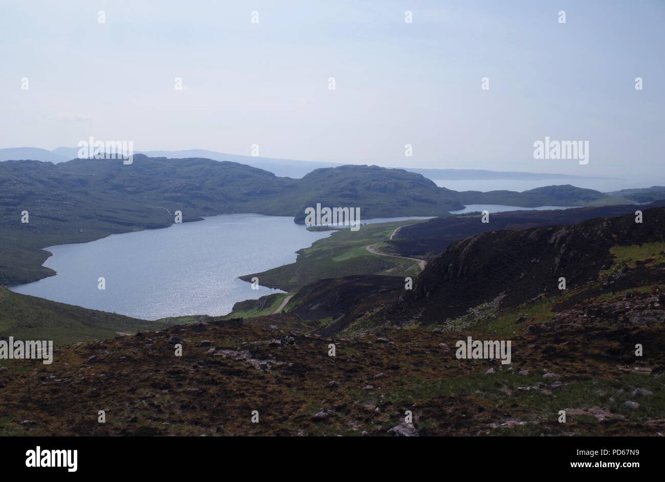 Loch Diabaigas Airde on a. Hazy Summers Day. Amid Rugged Highland ...