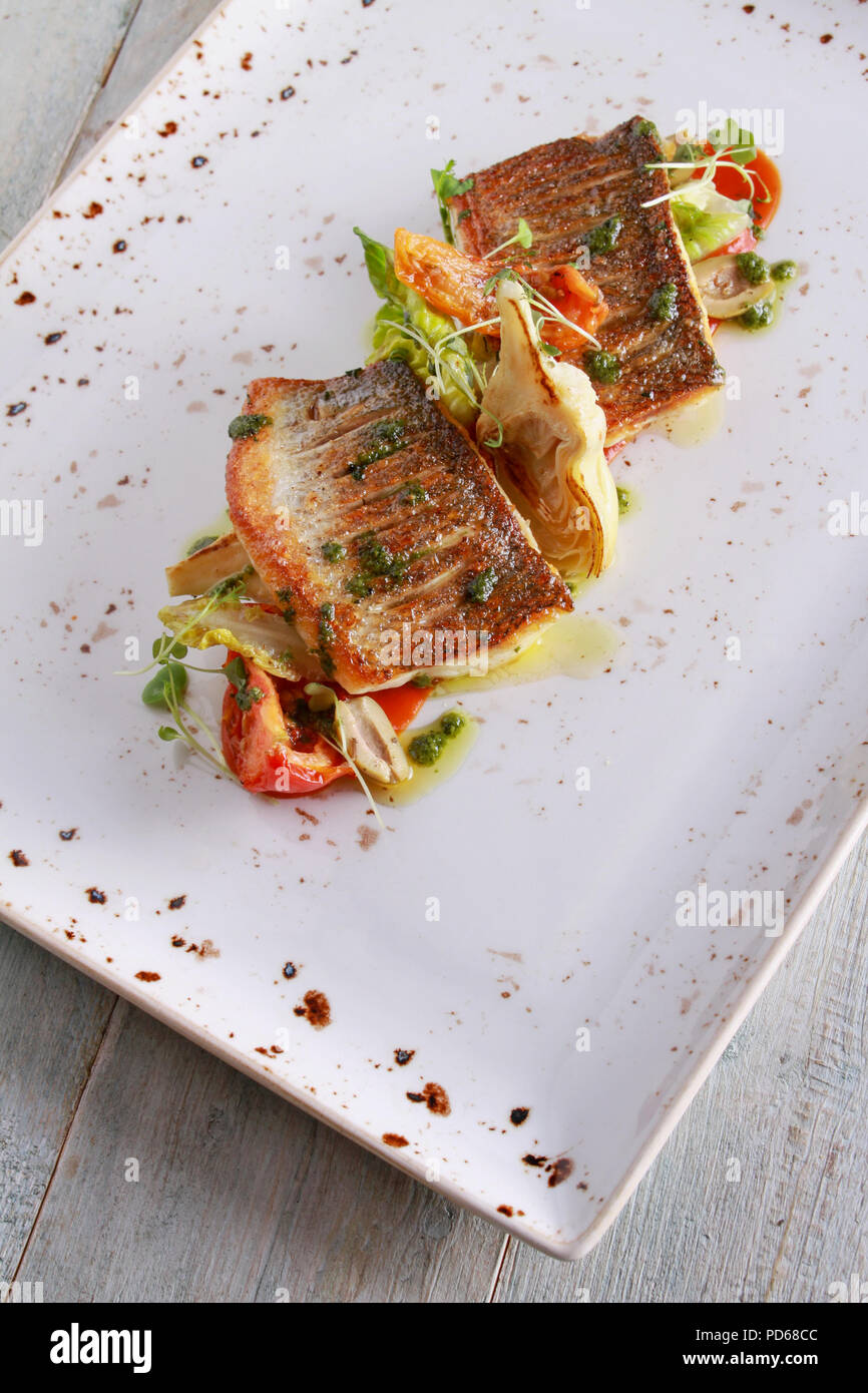 plated fish meal Stock Photo - Alamy
