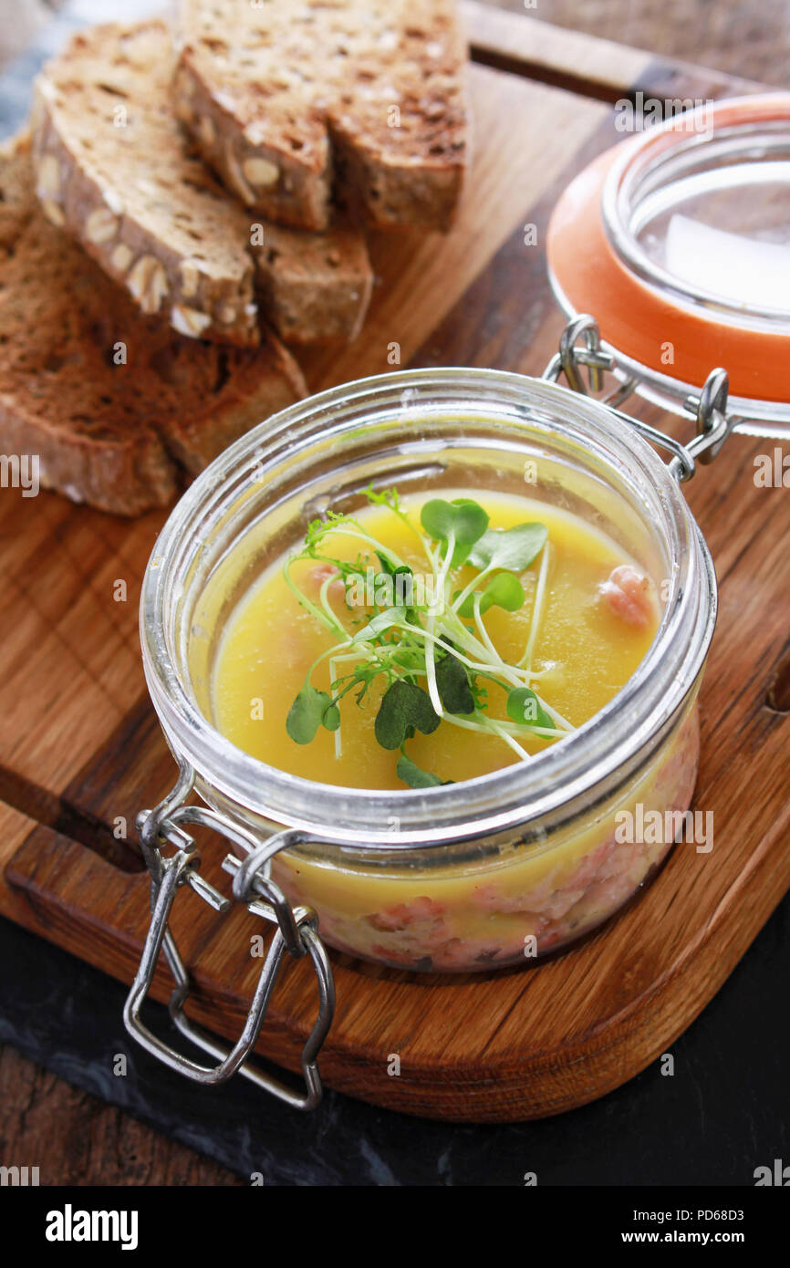 traditional potted shrimp appetizer served with toasted brown bread ...