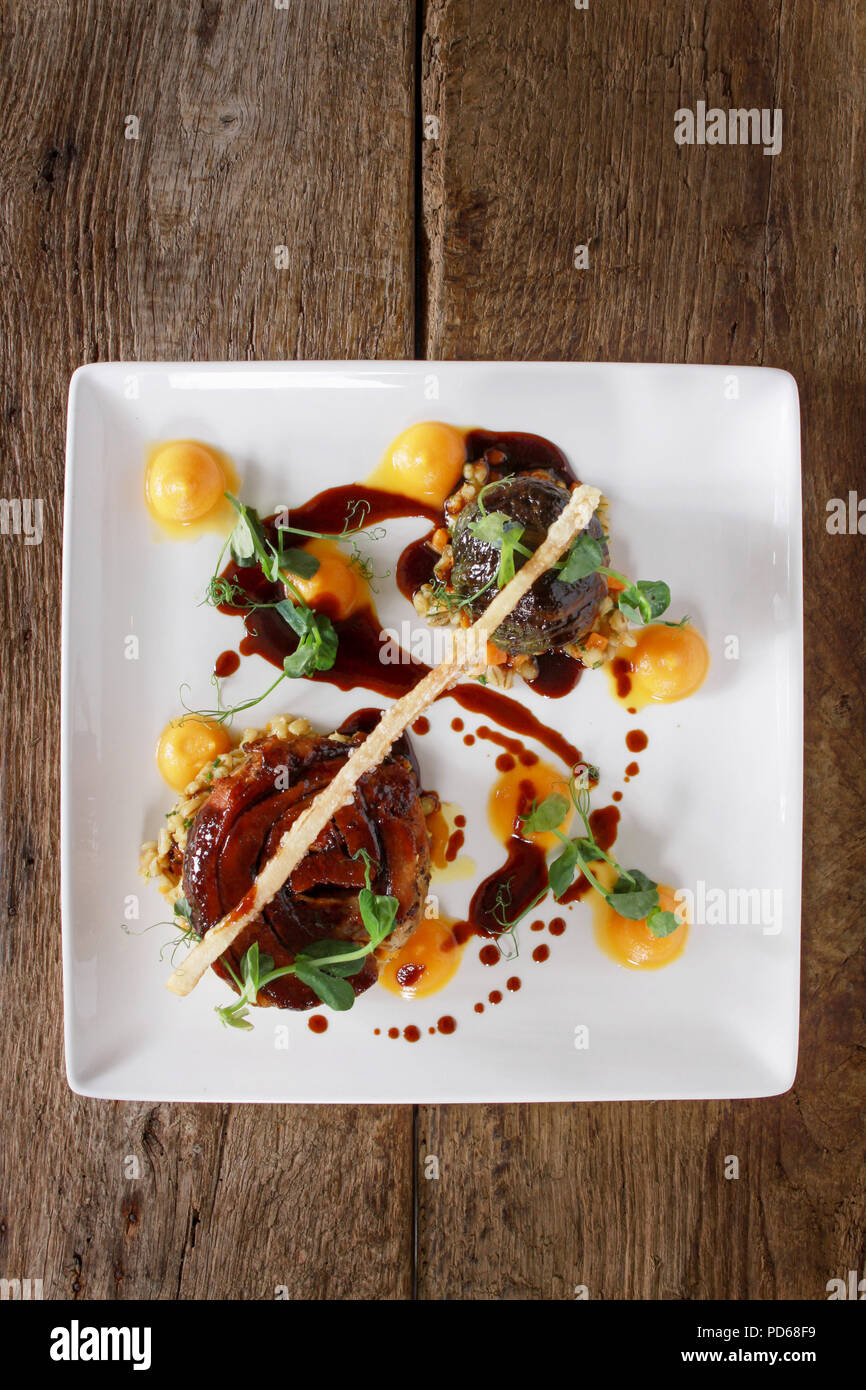 plated pork meal Stock Photo - Alamy