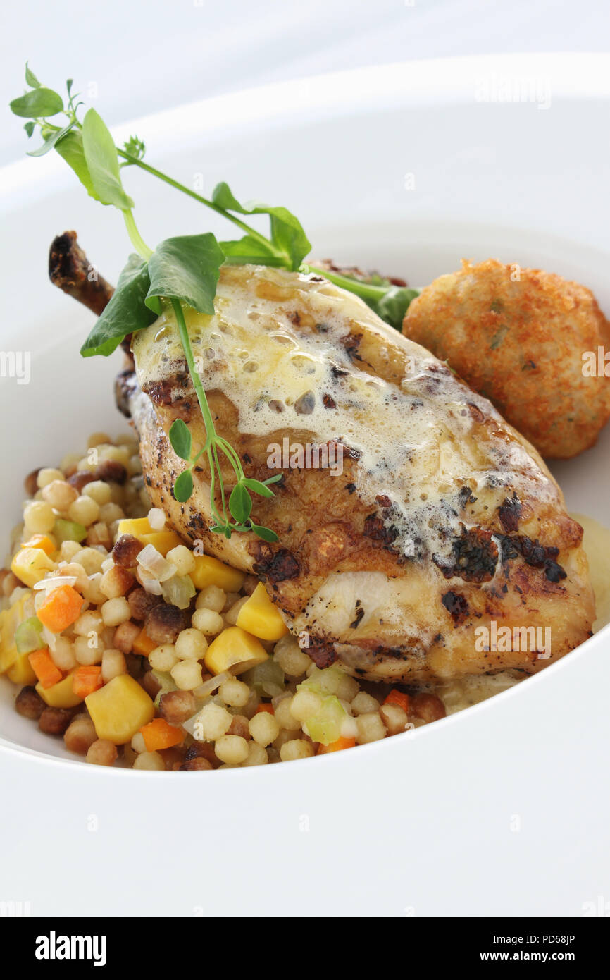 plated chicken main meal Stock Photo - Alamy