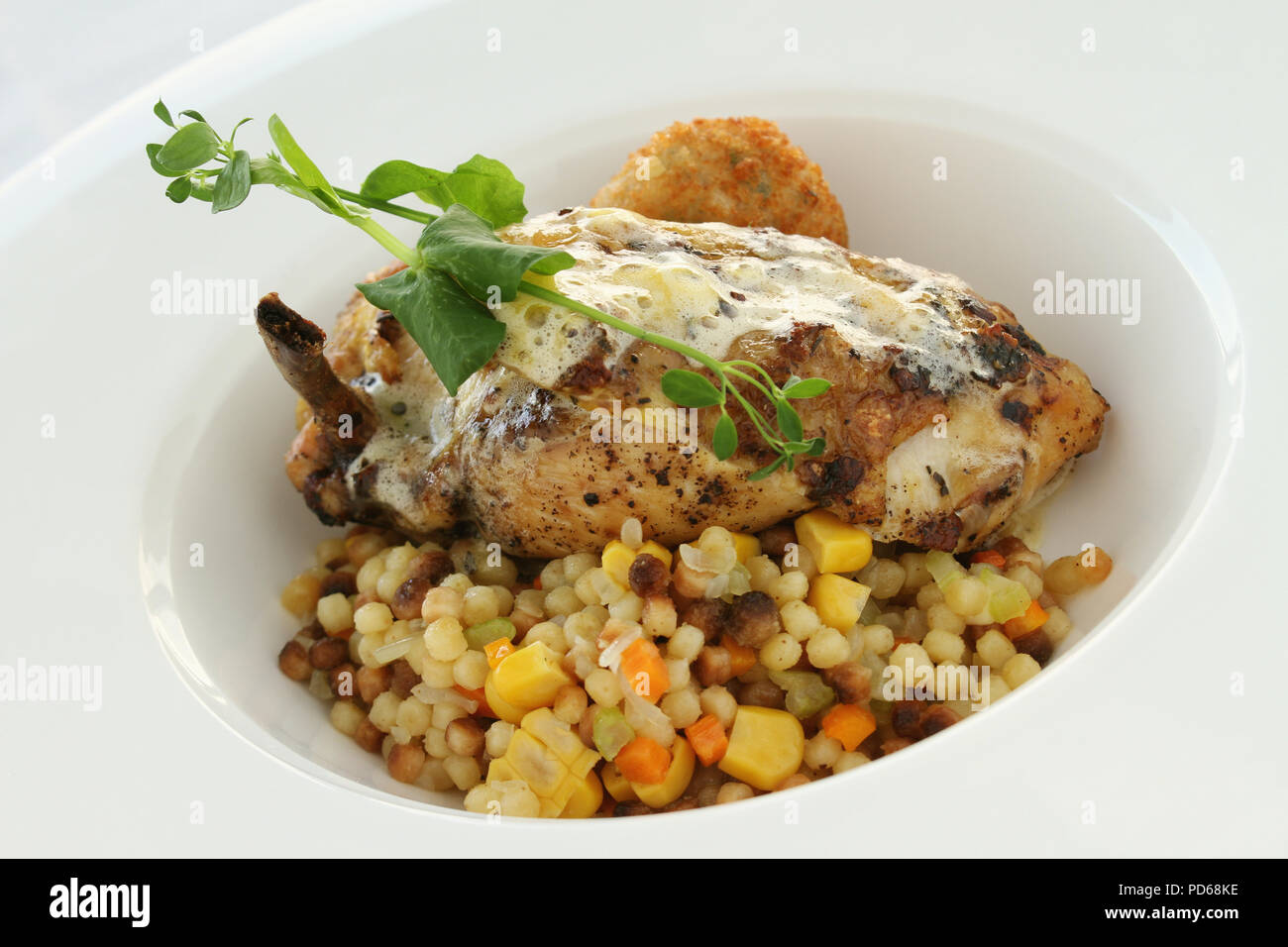 plated chicken main meal Stock Photo - Alamy