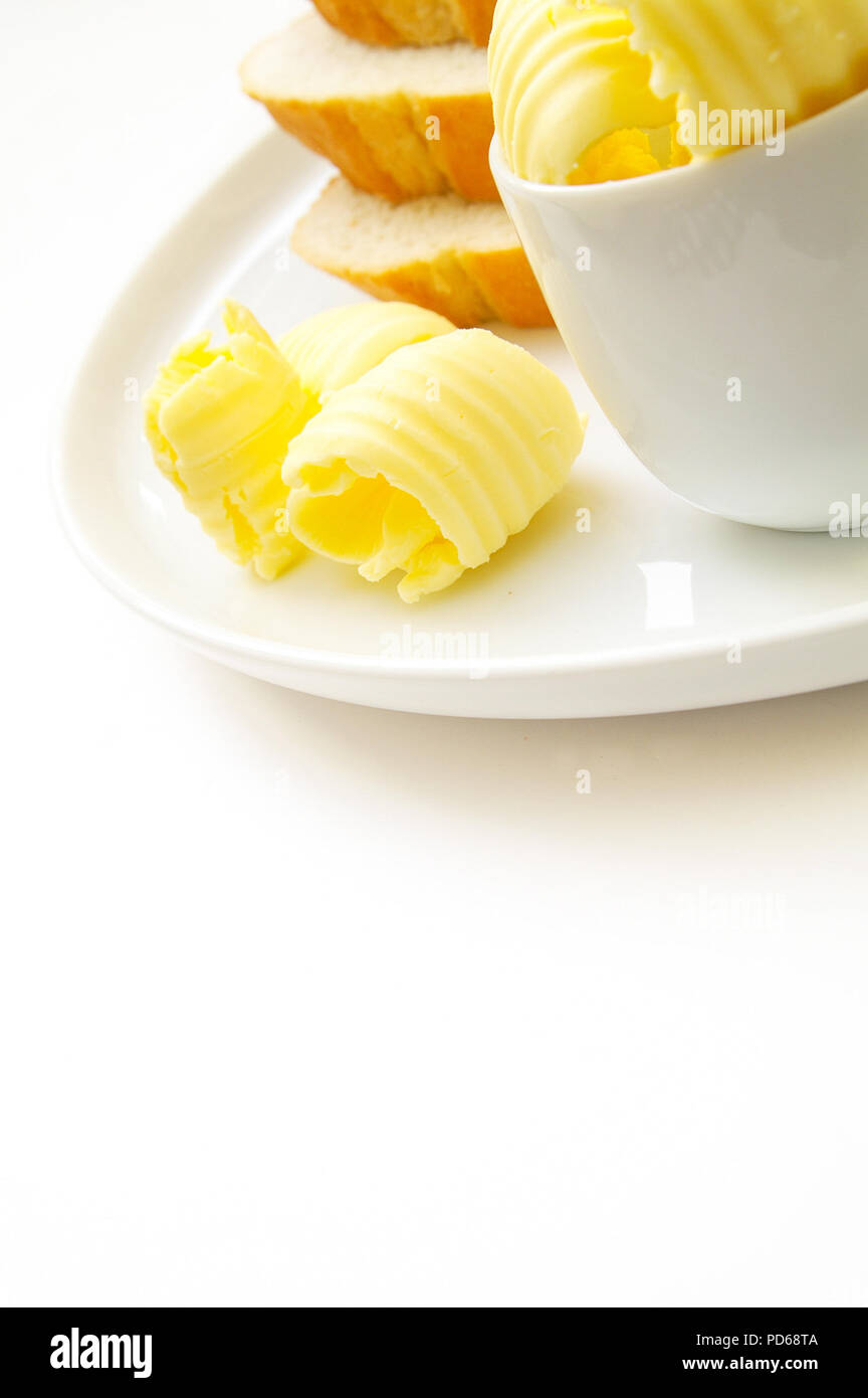 fresh butter curls in dish Stock Photo - Alamy