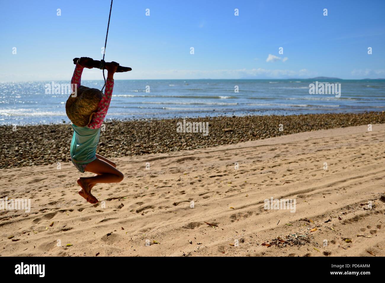 Swinging On A Tree Rope High Resolution Stock Photography and Images ...