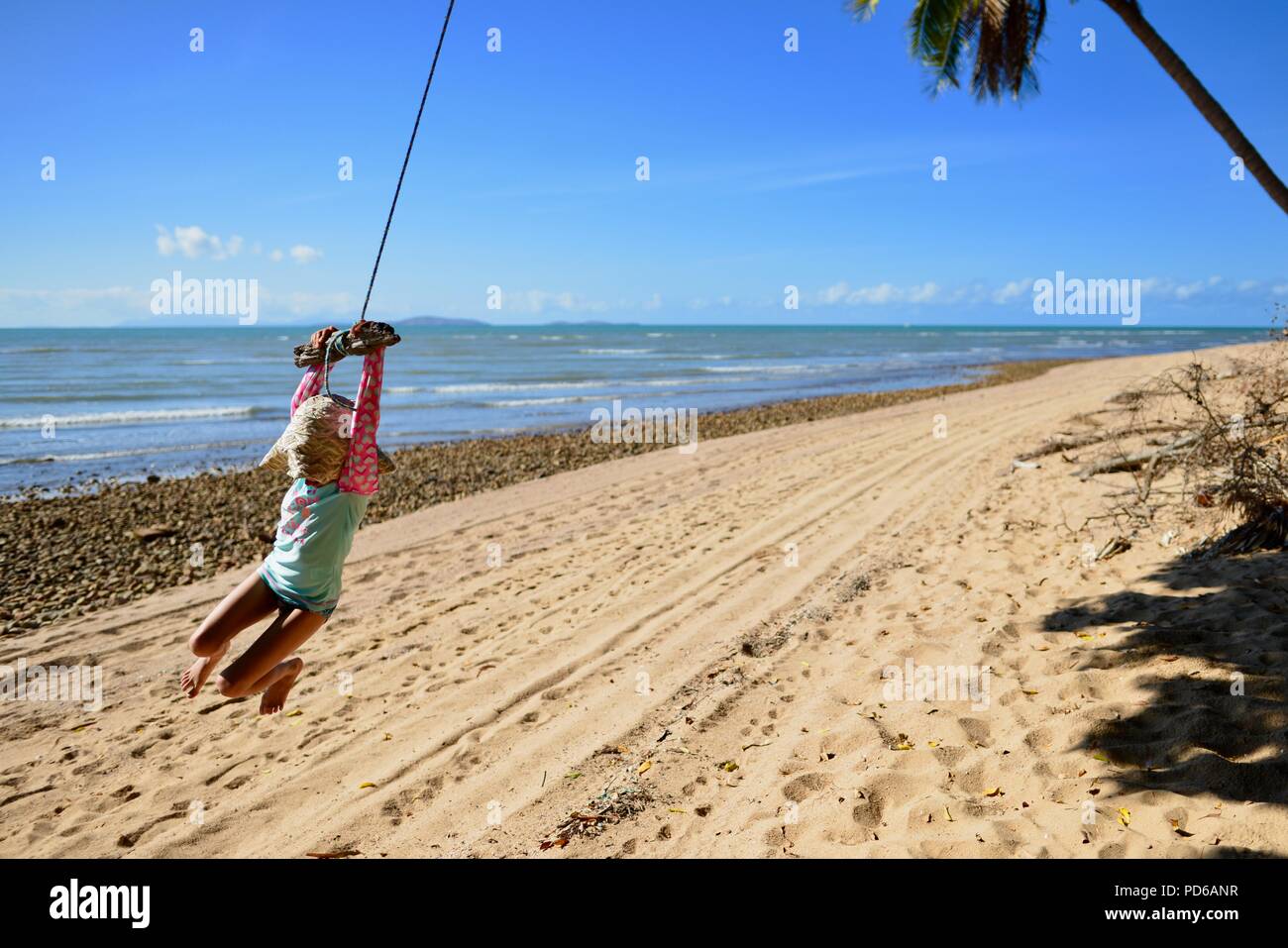 Swinging On A Tree Rope High Resolution Stock Photography and Images ...