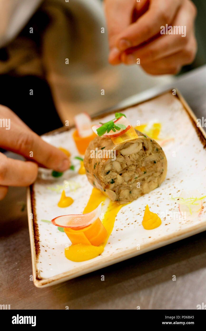 rabbit chicken terrine plated meal Stock Photo - Alamy