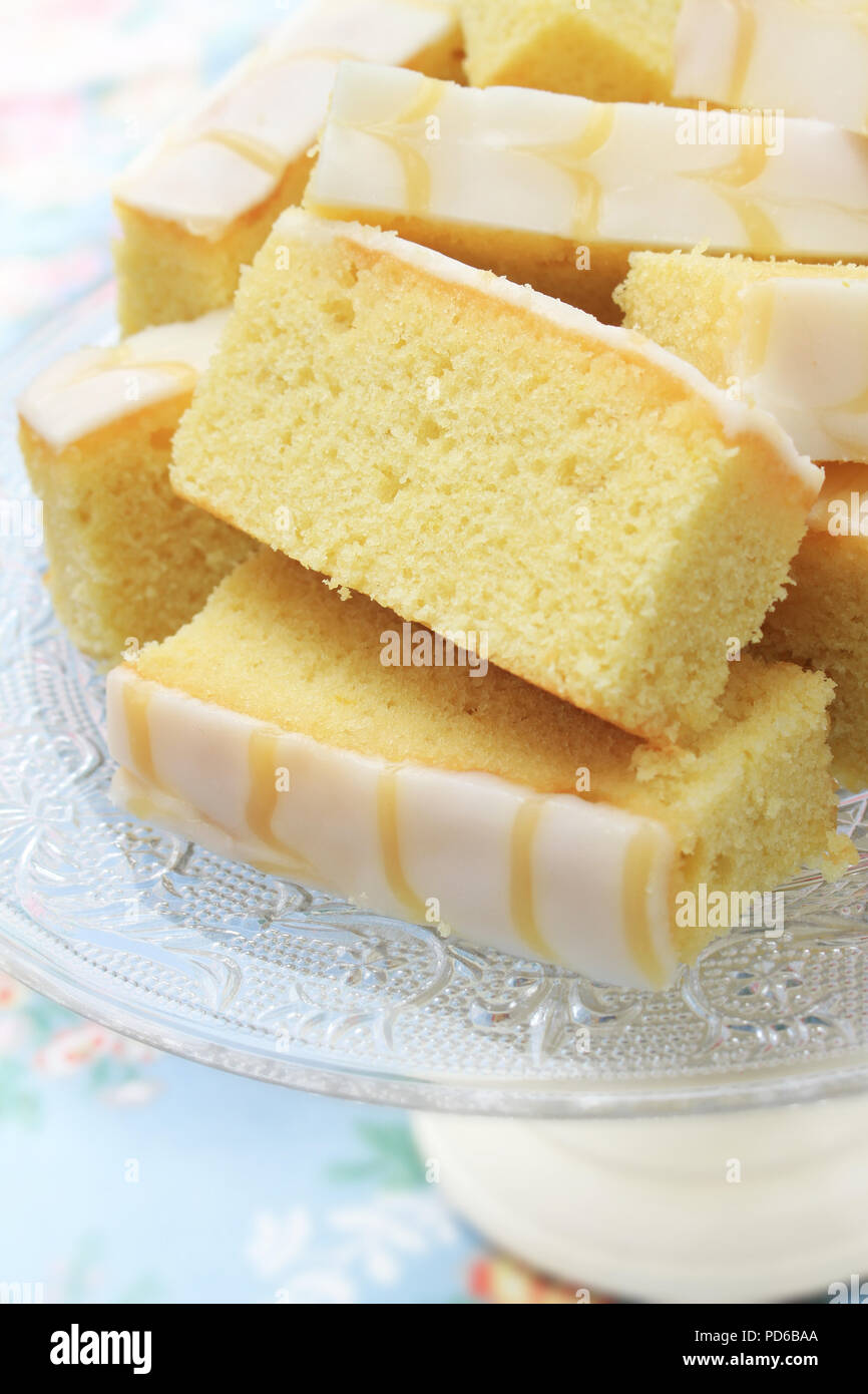 iced lemon sponge cake Stock Photo - Alamy