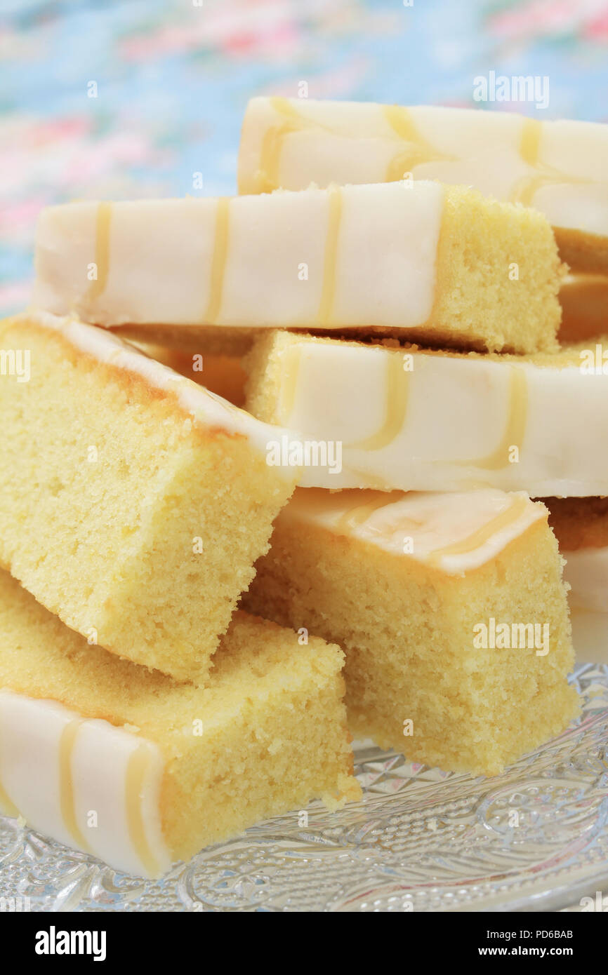 iced lemon sponge cake Stock Photo - Alamy