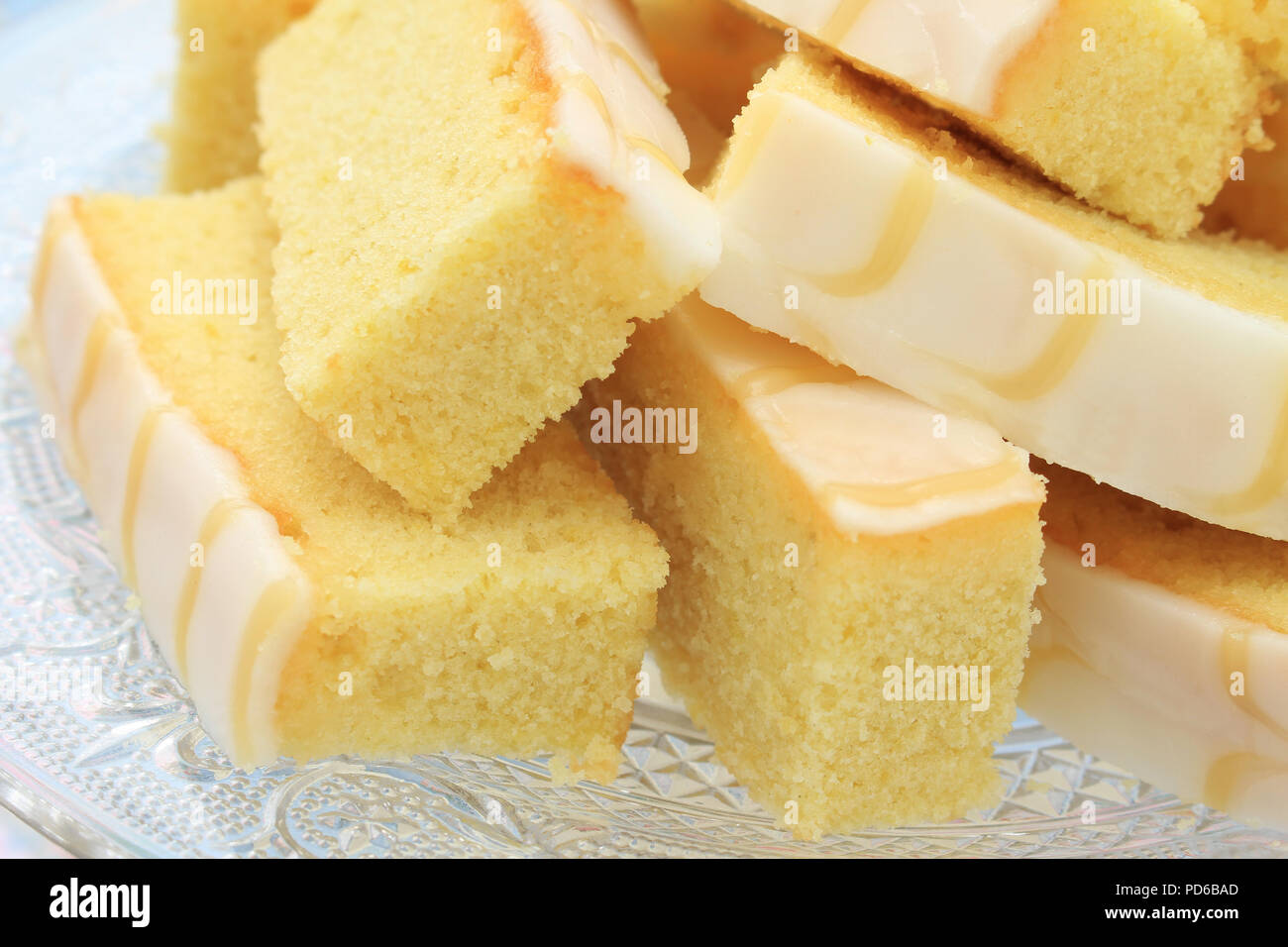 iced lemon sponge cake Stock Photo - Alamy