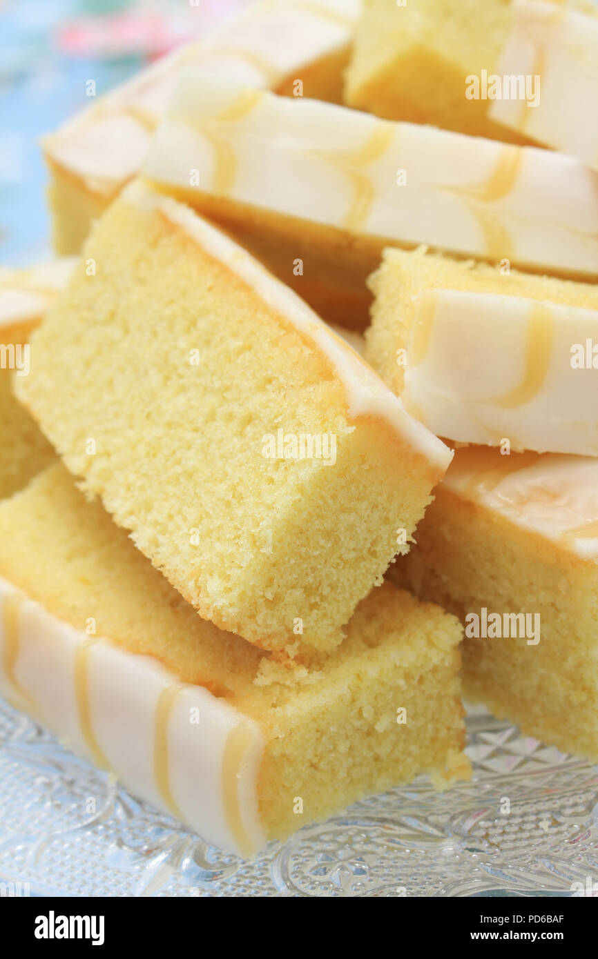 iced lemon sponge cake Stock Photo - Alamy