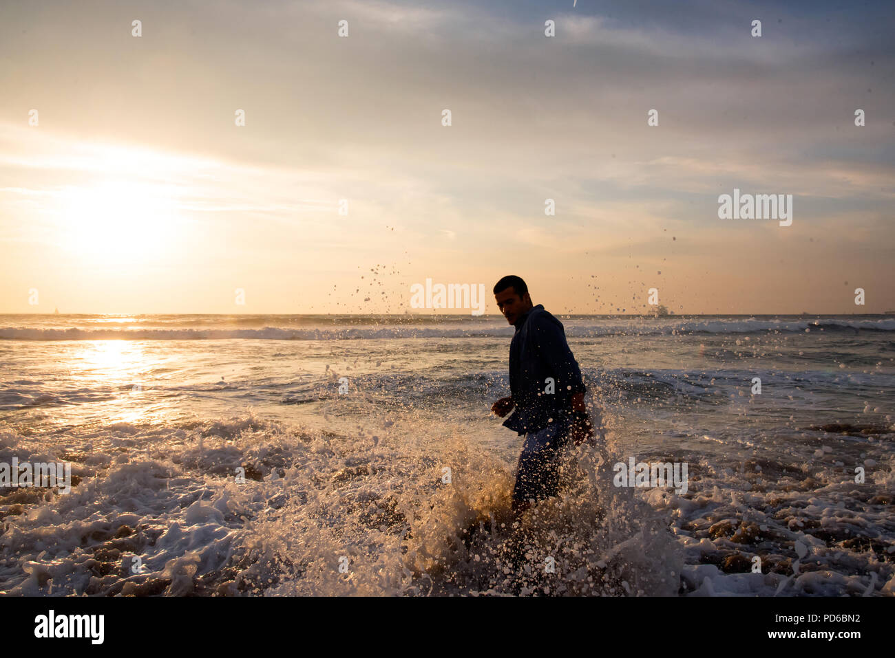 Handsome man with water splash hi-res stock photography and images - Alamy