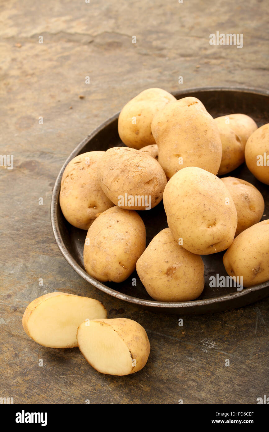 preparing fresh potatoes Stock Photo - Alamy