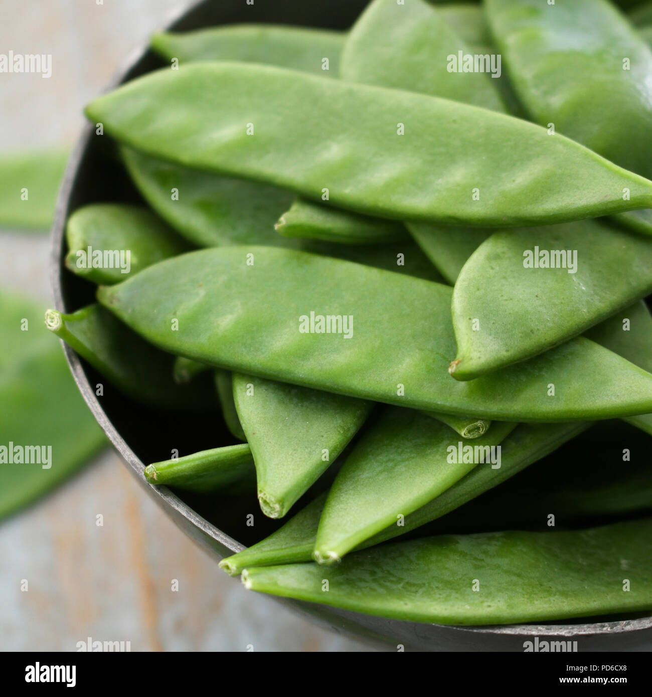 preparing mange tout beans Stock Photo - Alamy