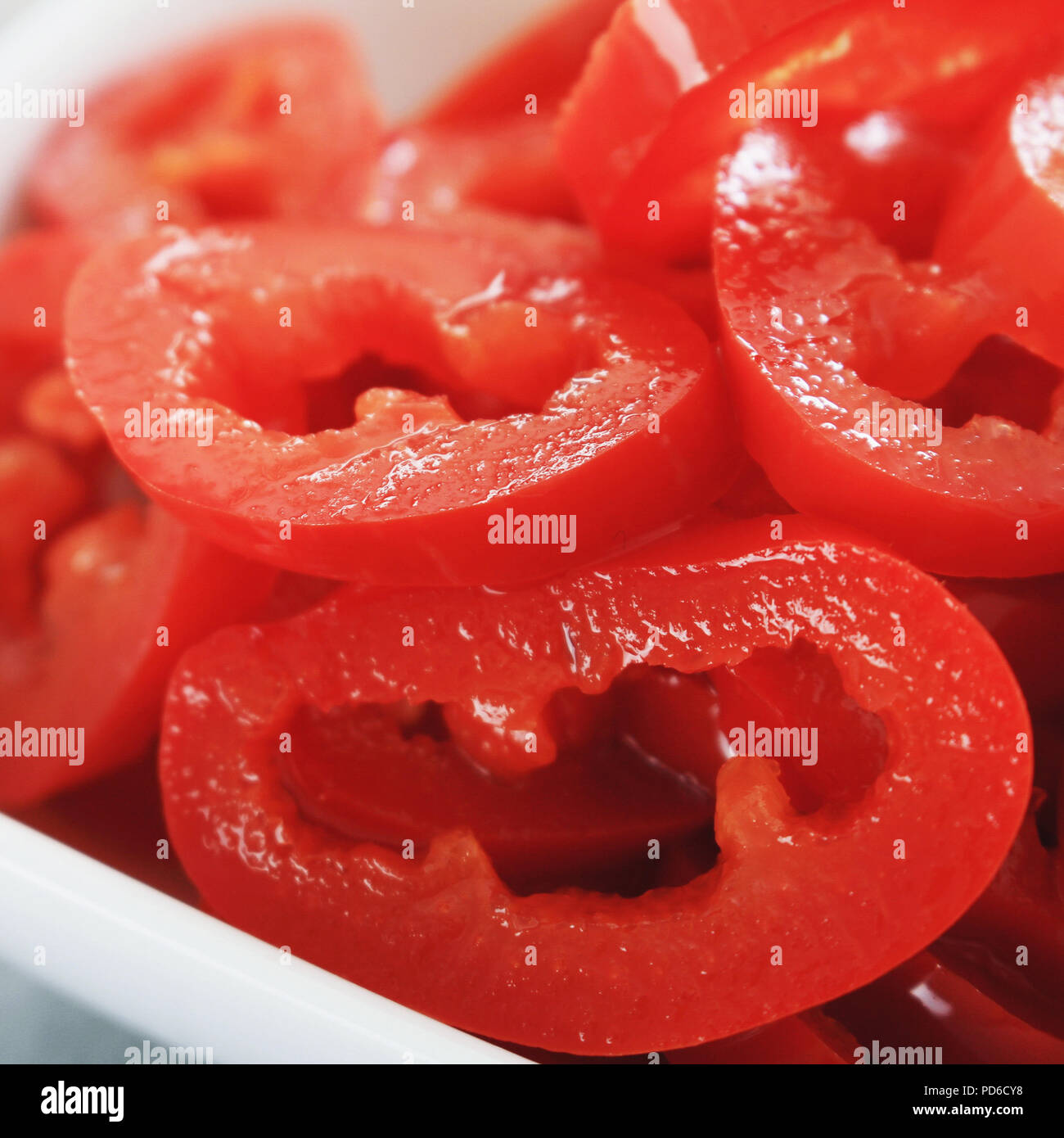 prepared sliced red chillies Stock Photo - Alamy