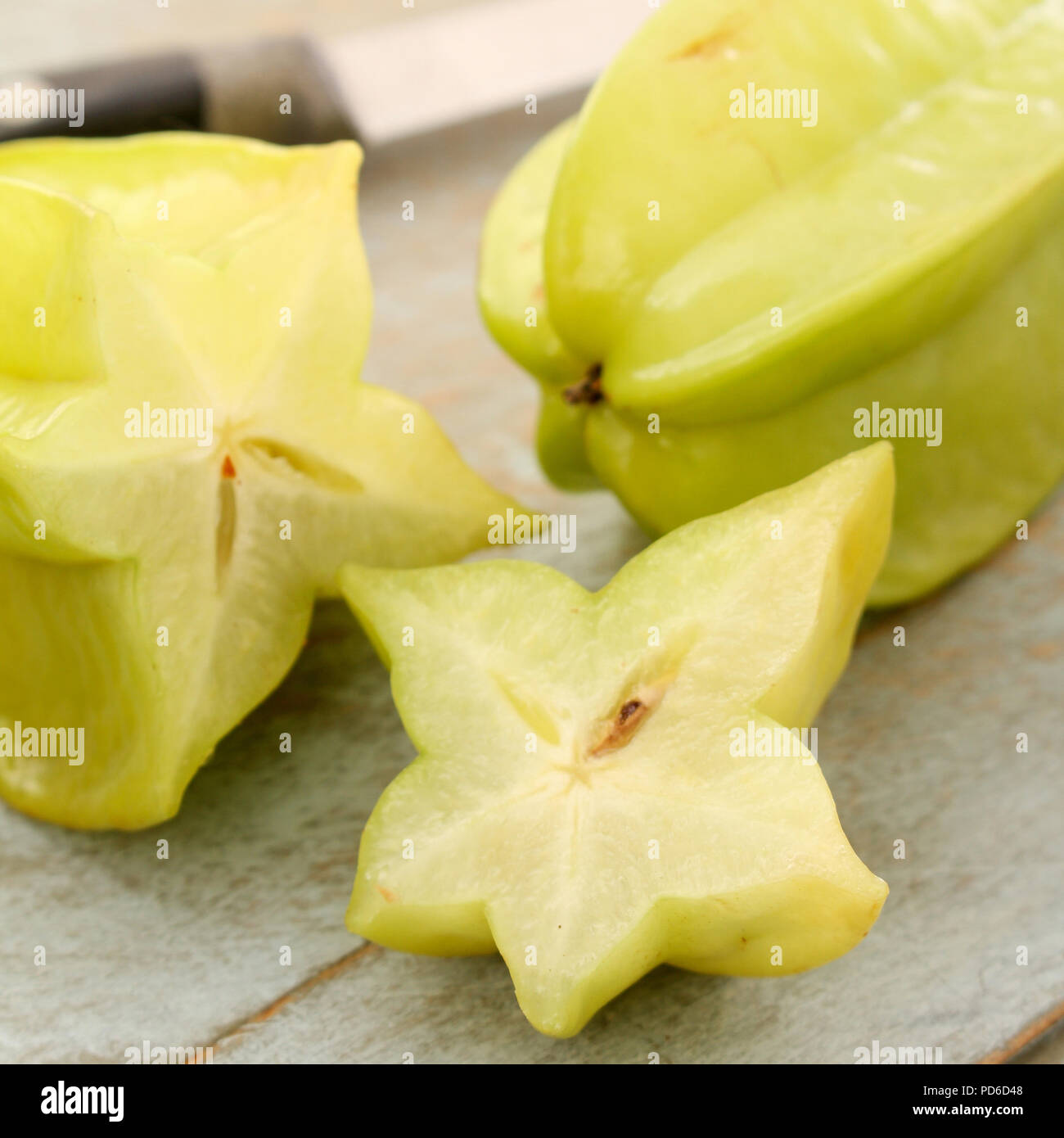 preparing fresh starfruit Stock Photo - Alamy