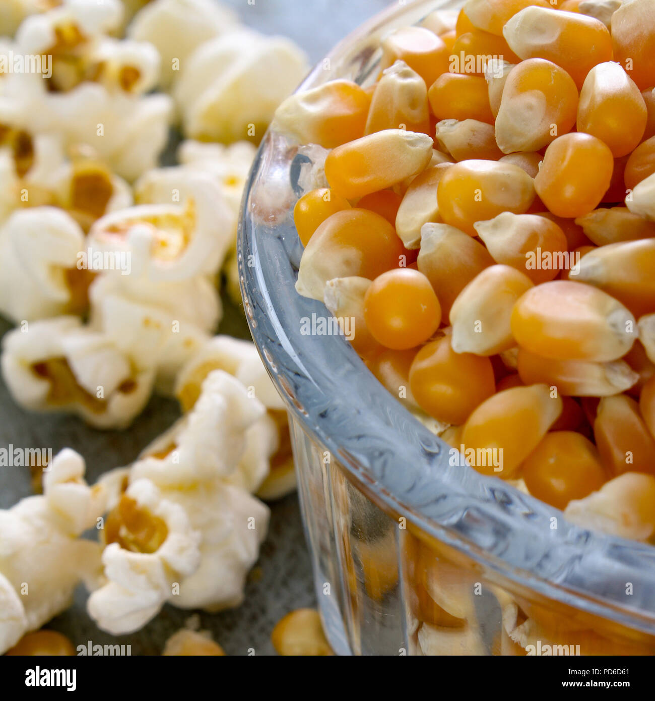Cooked and uncooked corn kernels hi-res stock photography and images ...